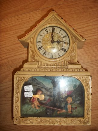 ELECTRIC CLOCKS-1574-HADDON ELECTRIC TEETER TOTTER CLOCK